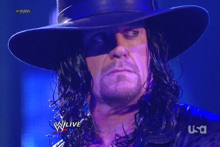 Why does Undertaker have long hair in the Summerslam poster? : r ...