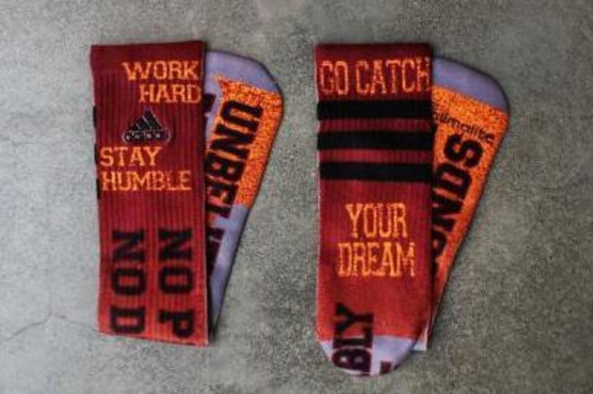Robert Griffin III Receives Special Rookie of the Year Socks from ...