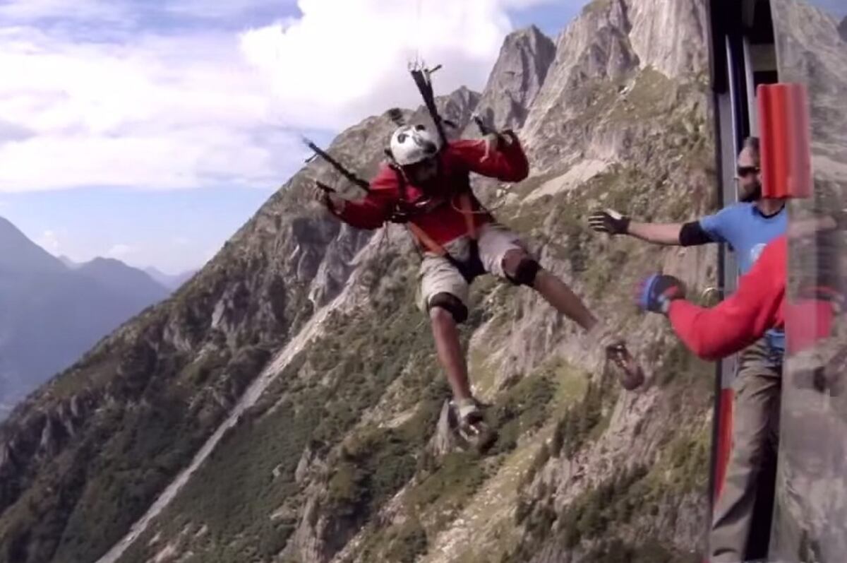 Speed Flyer Parachutes into Moving Cable Car 492 Feet Above the Ground ...