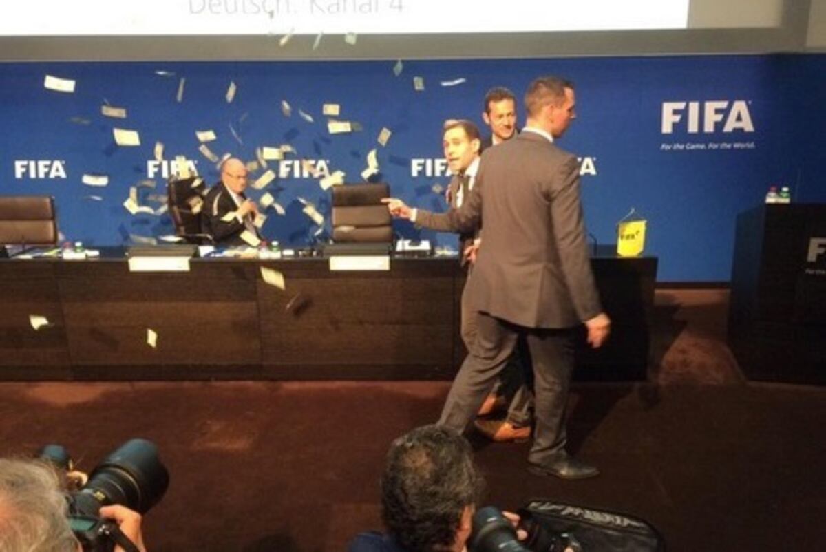 Comedian Simon Brodkin Crashes FIFA Conference, Throws Money over Sepp ...