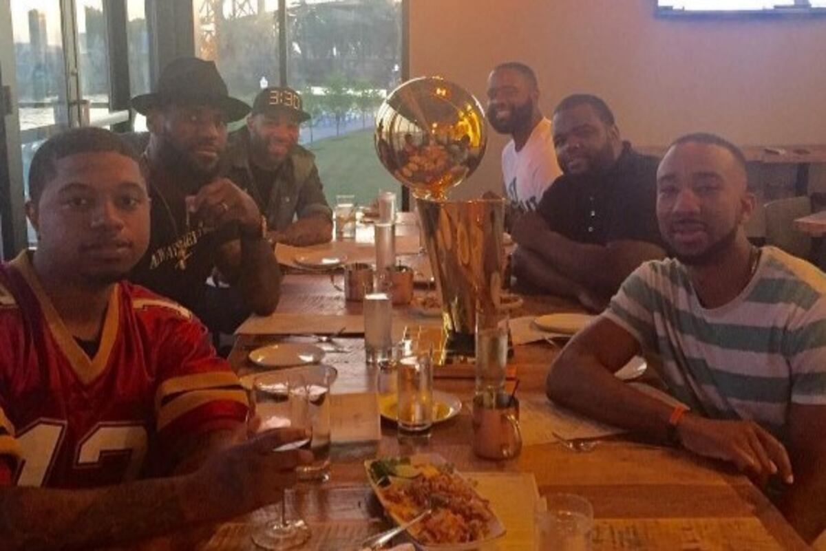 LeBron James Eats with Championship Trophy on Table at Restaurant ...