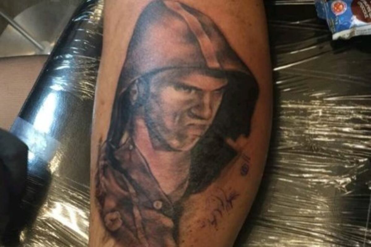 Fan Gets Michael Phelps' Angry Pre-Race Face Tattooed on Leg | News ...