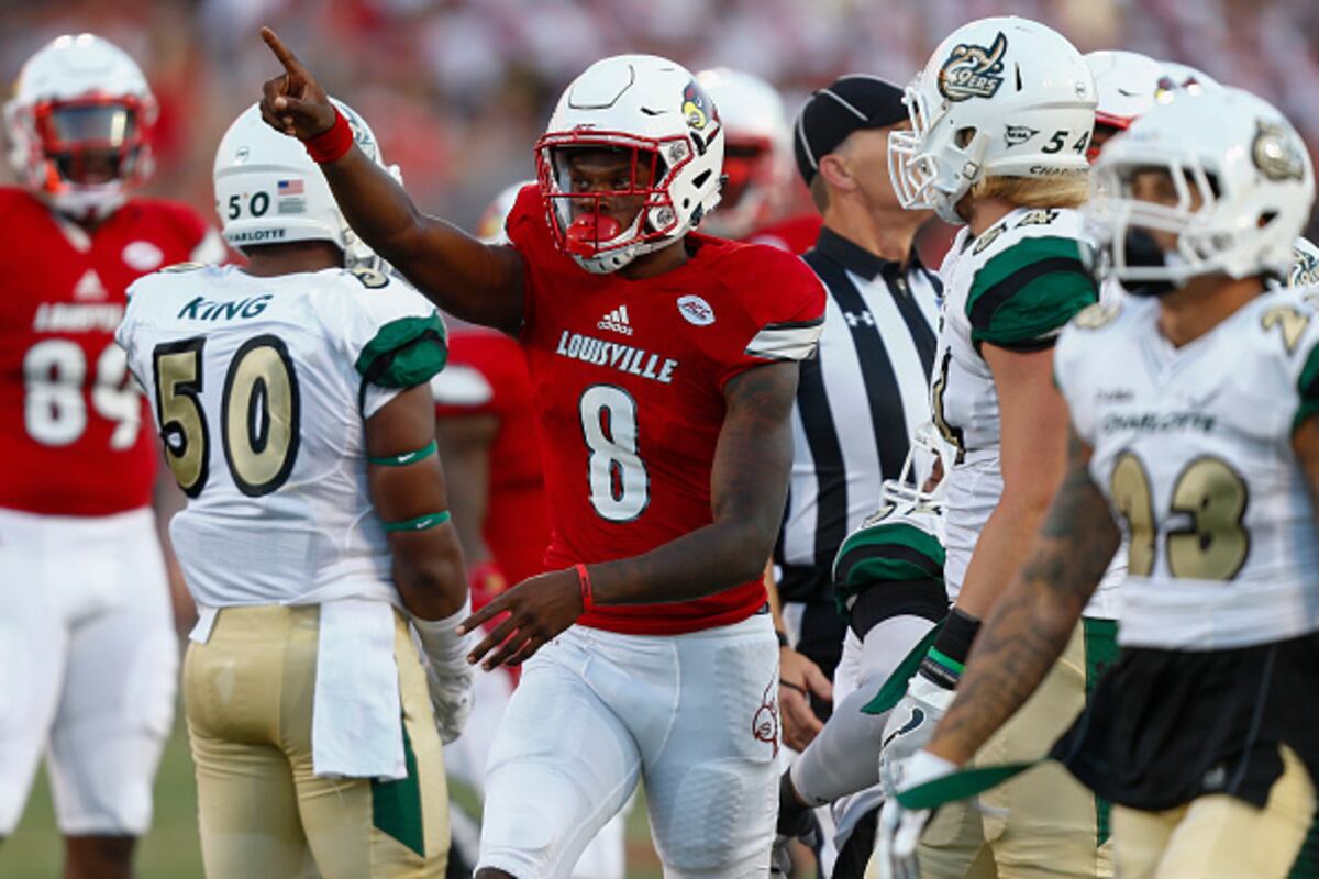 Lamar Jackson Sets School Record with 8 Total Touchdowns, All in the ...