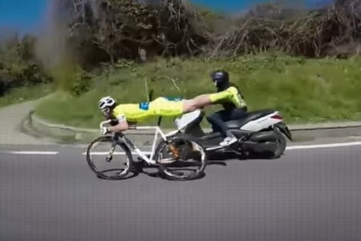 Cyclist Does Superman Planking Pose on Bike, Surges Past Other Riders ...