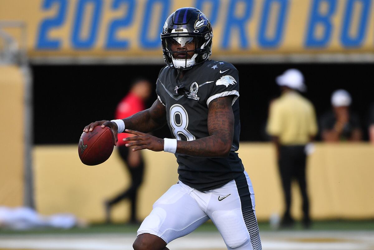 Video: Watch Lamar Jackson Scramble, Flip over Jet Ski Playing Beach ...