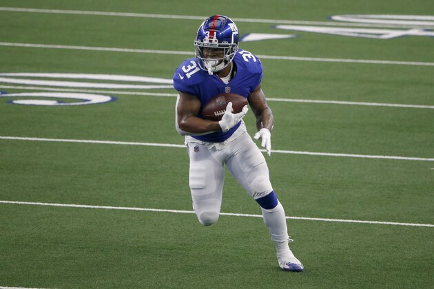 Giants' Devonta Freeman Doesn't Return vs. Eagles After Suffering Ankle ...