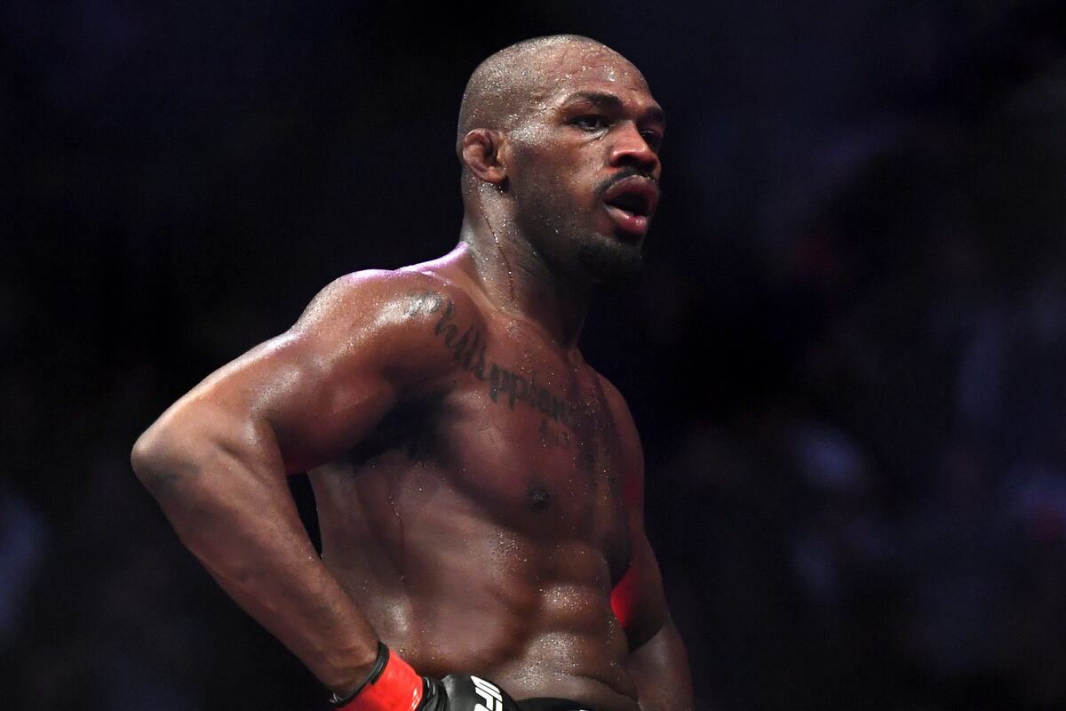 UFC's Jon Jones Posts Video of Himself with Shotgun Chasing Down ...