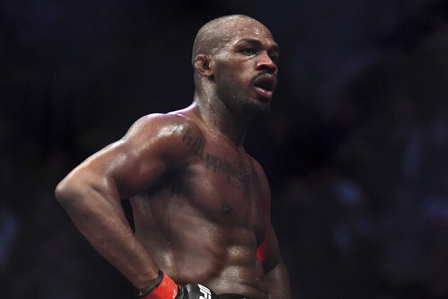 UFC's Jon Jones Posts Video of Himself with Shotgun Chasing Down ...